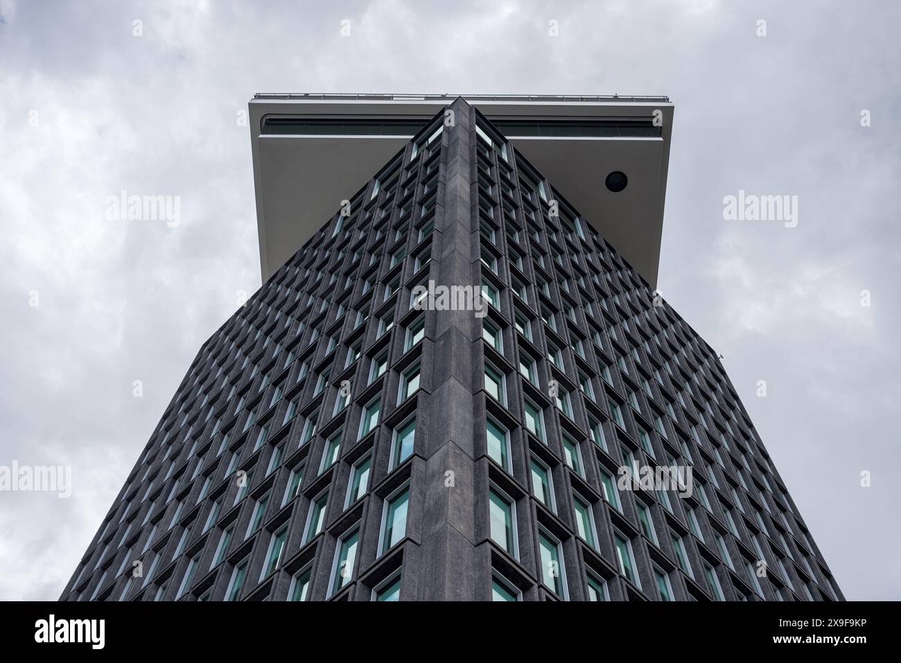 Admiring the modern A'Dam Lookout tower as it dominates the Amsterdam ...