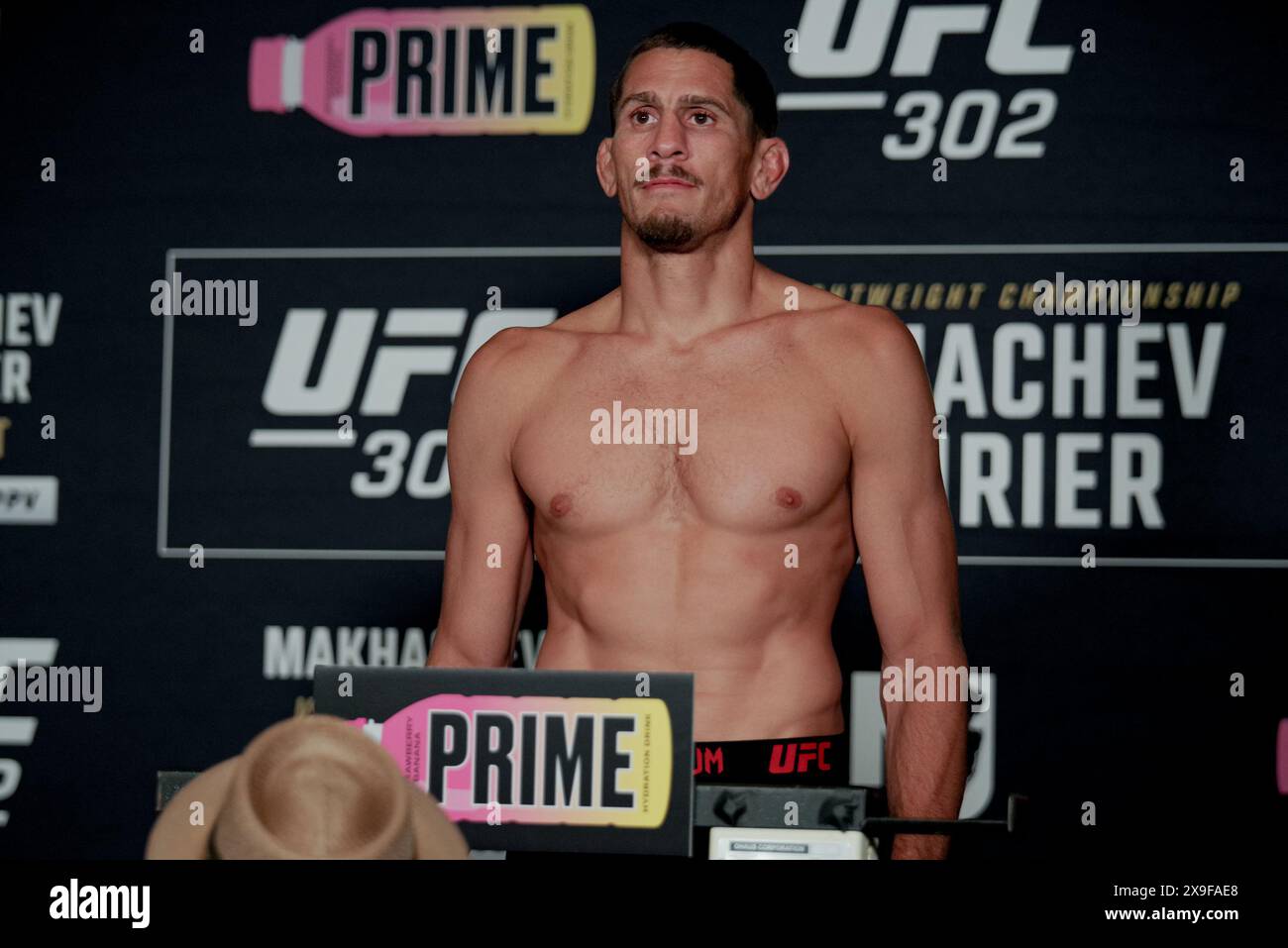 Newark, Newark, Nj, USA. 31st May, 2024. Niko Price poses on the scale ...