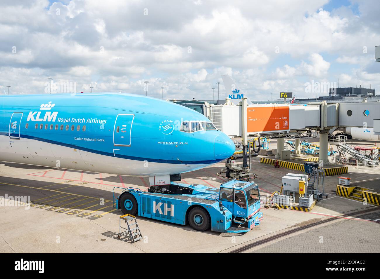 A KLM aircraft pictured about to be pushed back from its a gate at ...