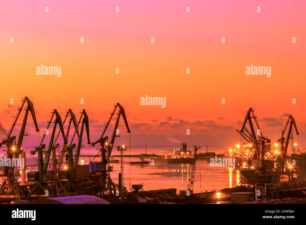 Port of Klaipeda illuminated at sunset, Lithuania Stock Photo - Alamy