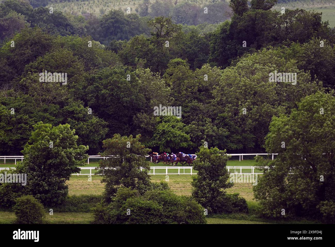 Runners and riders during the Betfred Oaks on ladies day of The Betfred ...