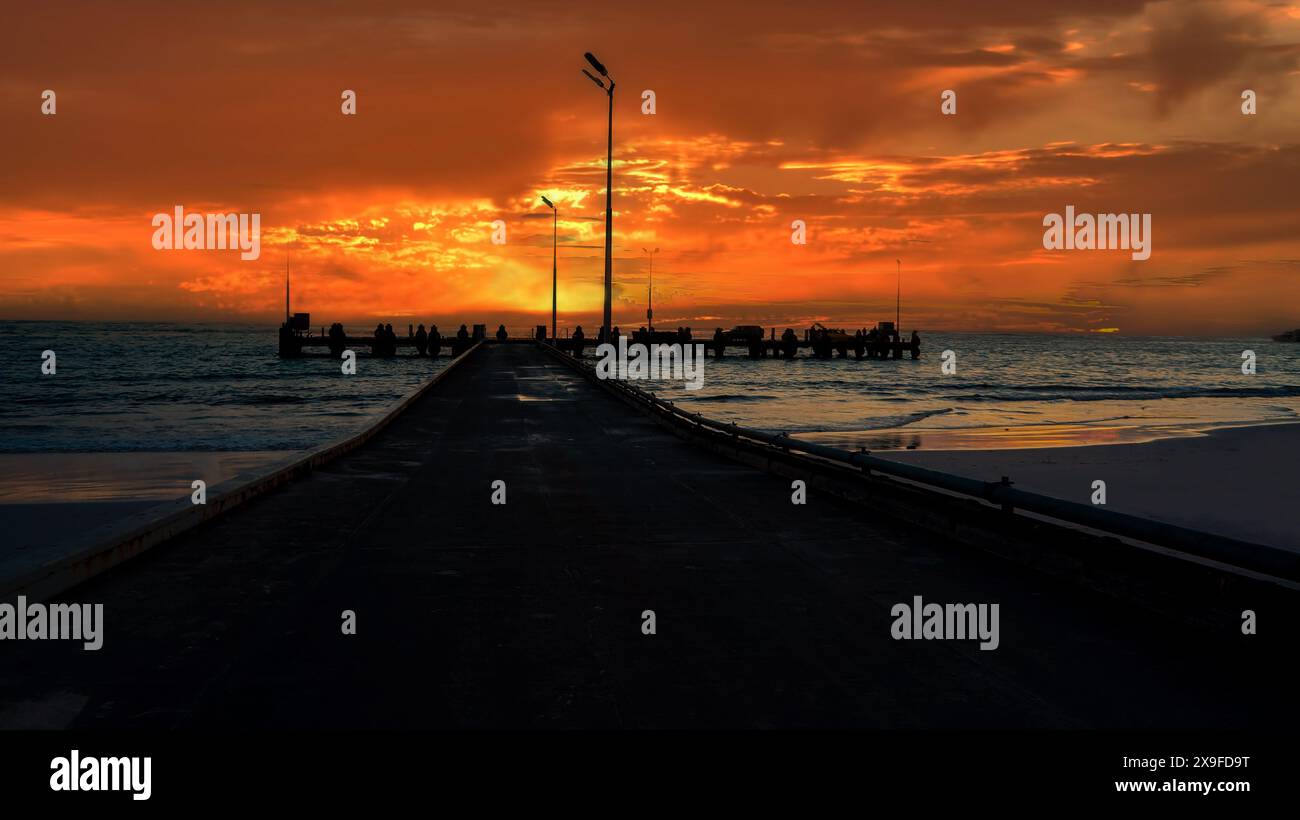 Silhouette of a jetty at sunset, Lancelin, Western Australia, Australia ...