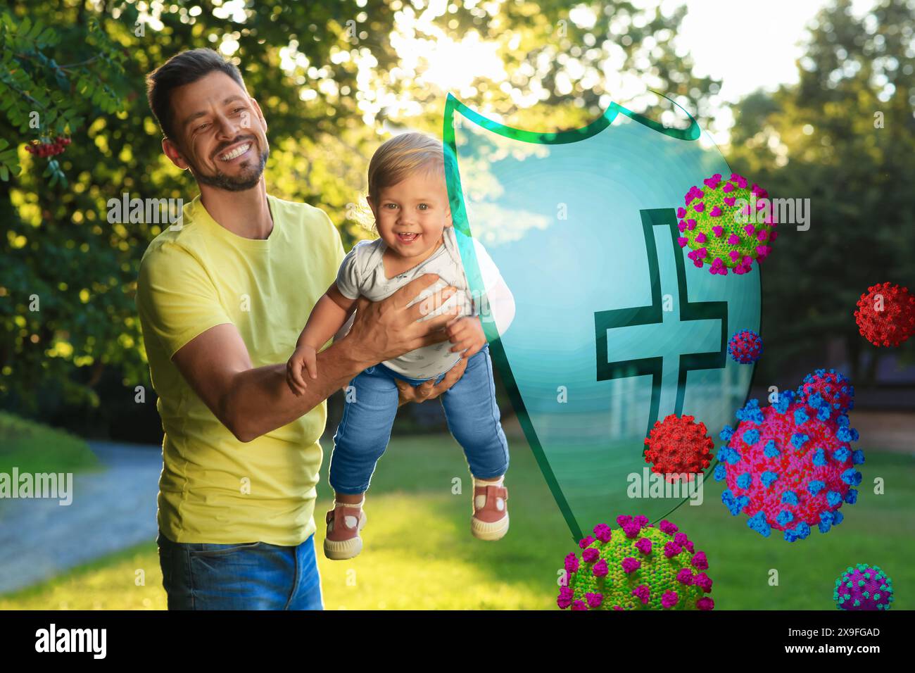 Father with his child having fun outdoors. Shield blocking viruses ...