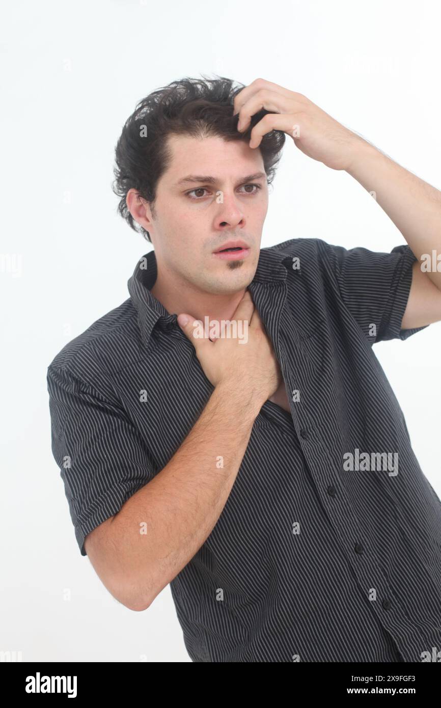 stressed out and worried young man on white background Stock Photo - Alamy