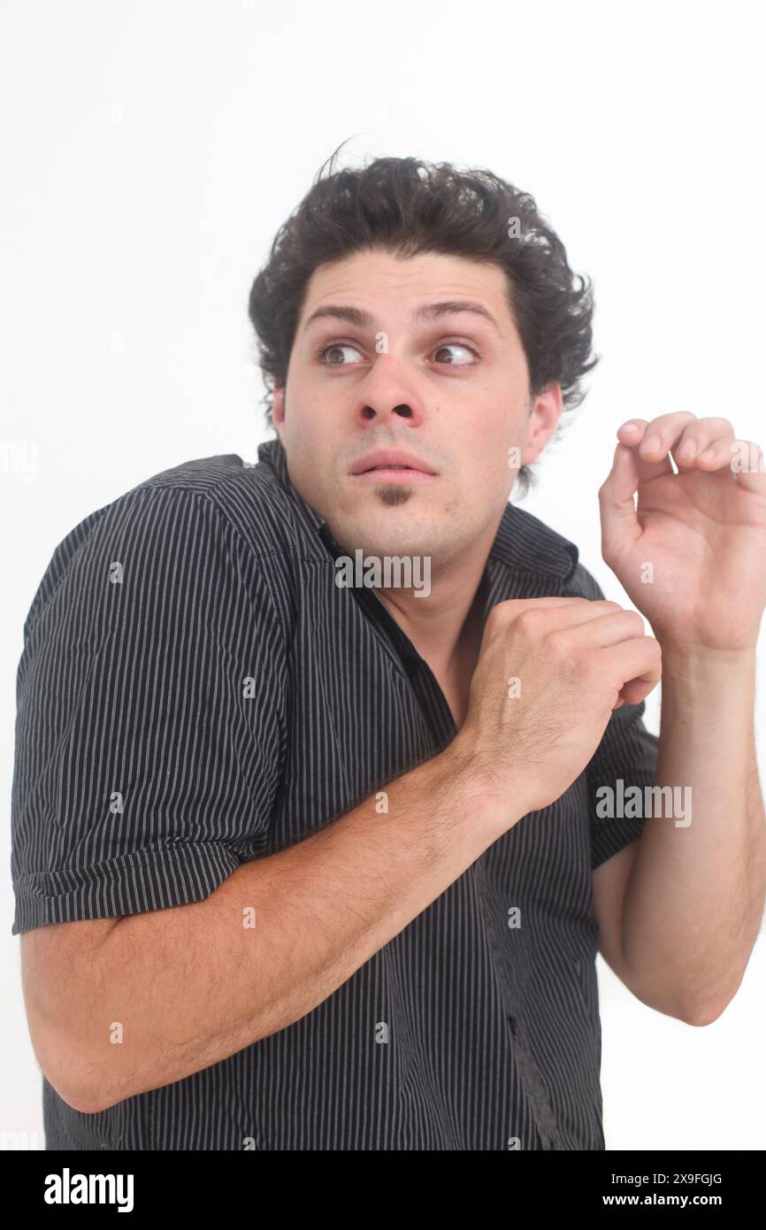 frustrated young man on white background Stock Photo - Alamy