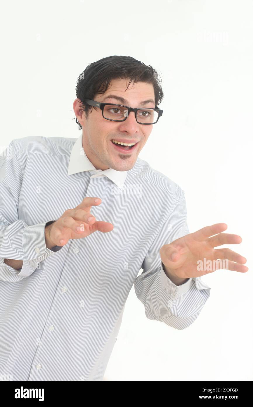 shy and insecure male nerd wearing glasses on white background Stock ...