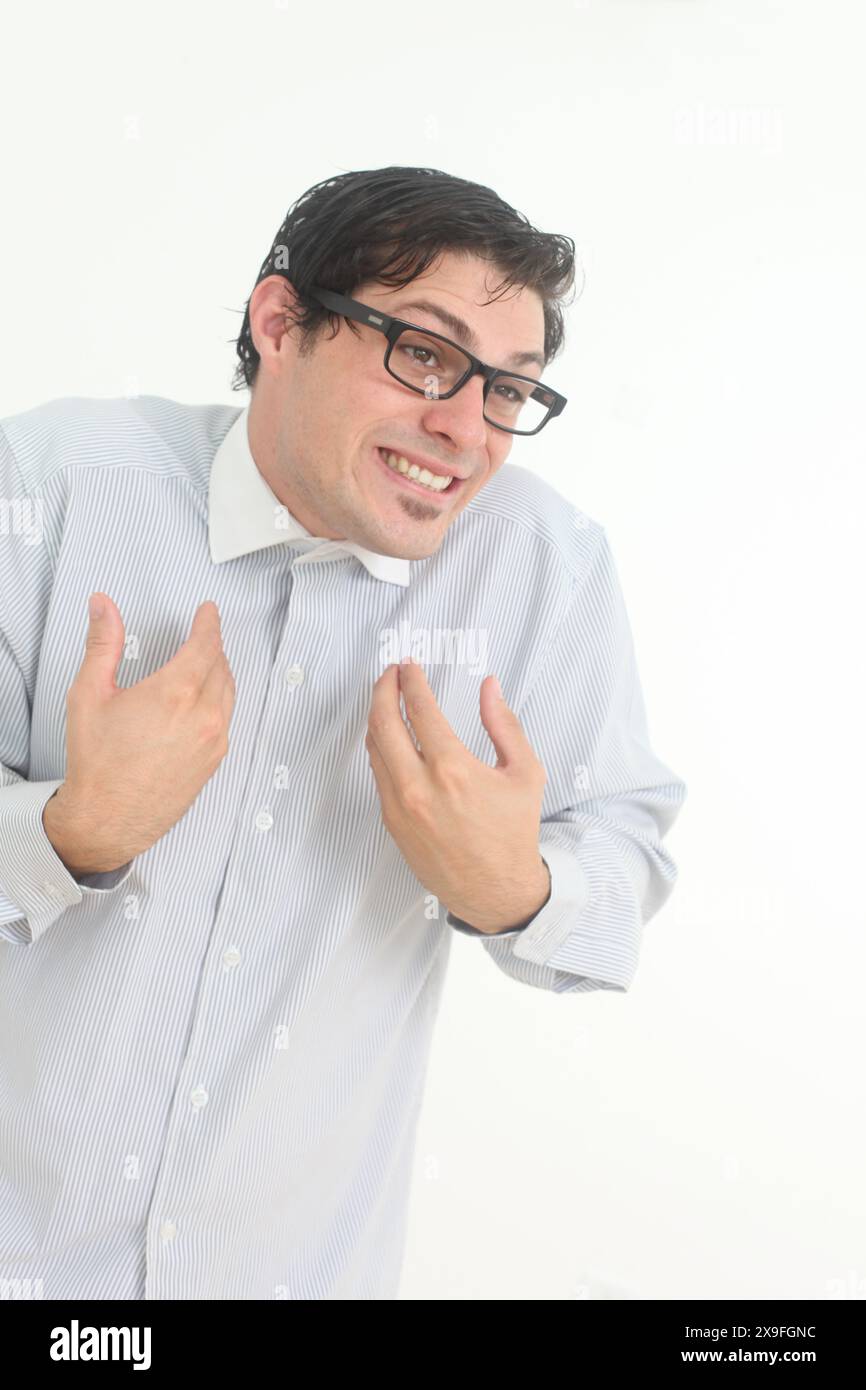 shy and insecure male nerd wearing glasses on white background Stock ...