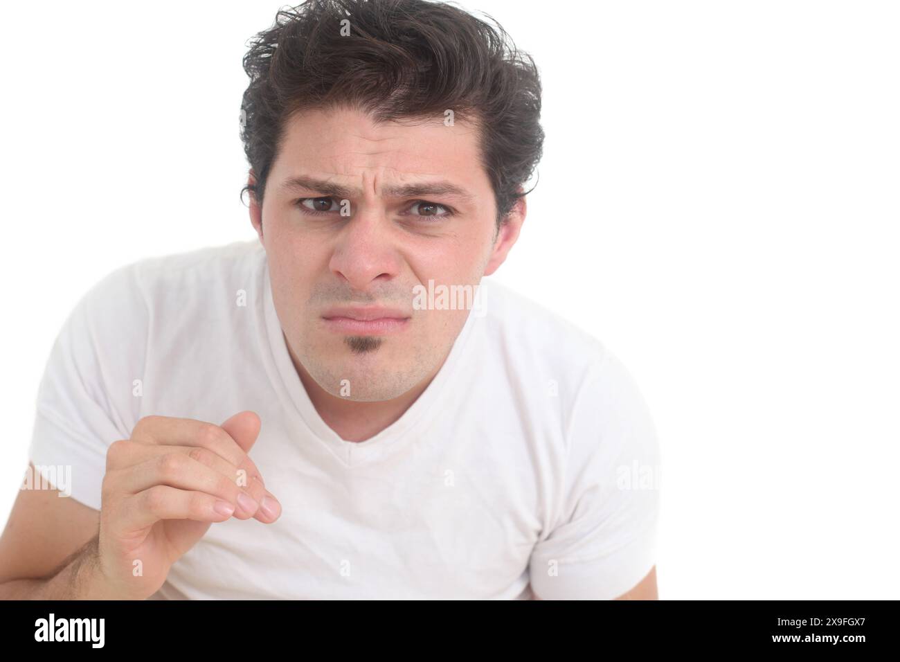 confused and annoyed man on white background Stock Photo - Alamy