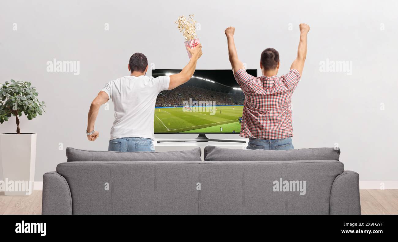 Soccer tv jumping hi-res stock photography and images - Alamy
