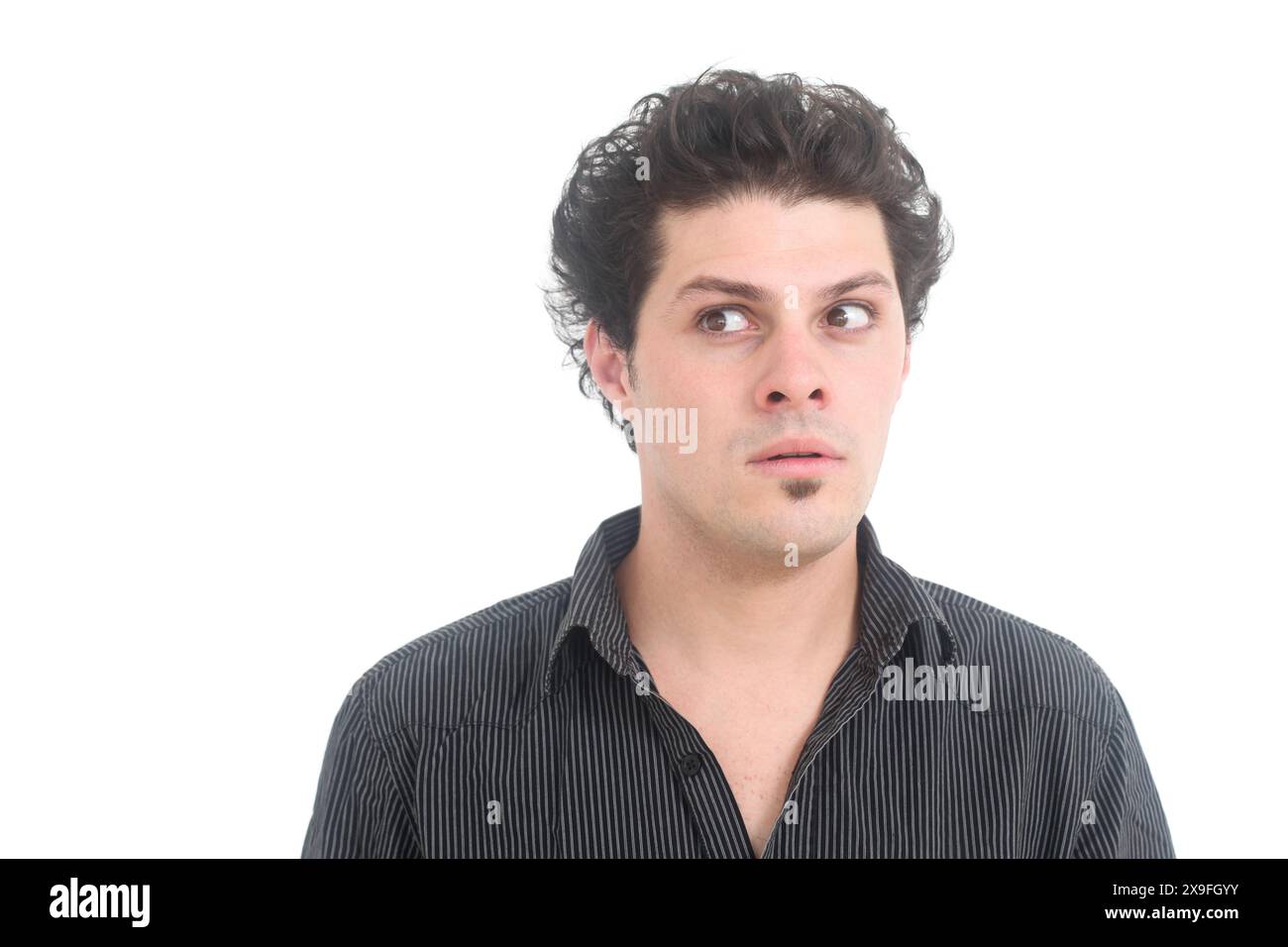 confused and annoyed man on white background Stock Photo - Alamy