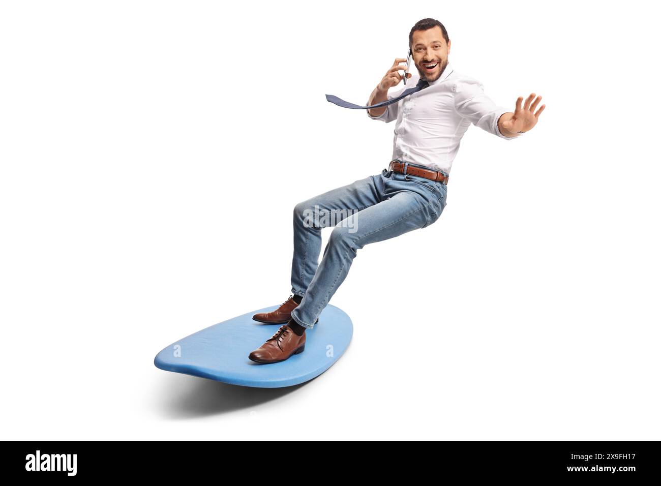 Man making a phone call and riding a surfboard isolated on white ...