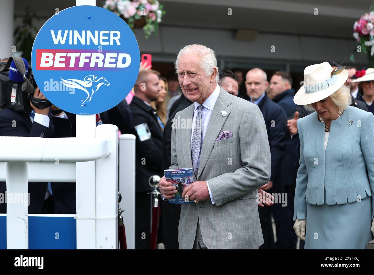King Charles III (left) and Queen Camilla ahead of presenting the ...
