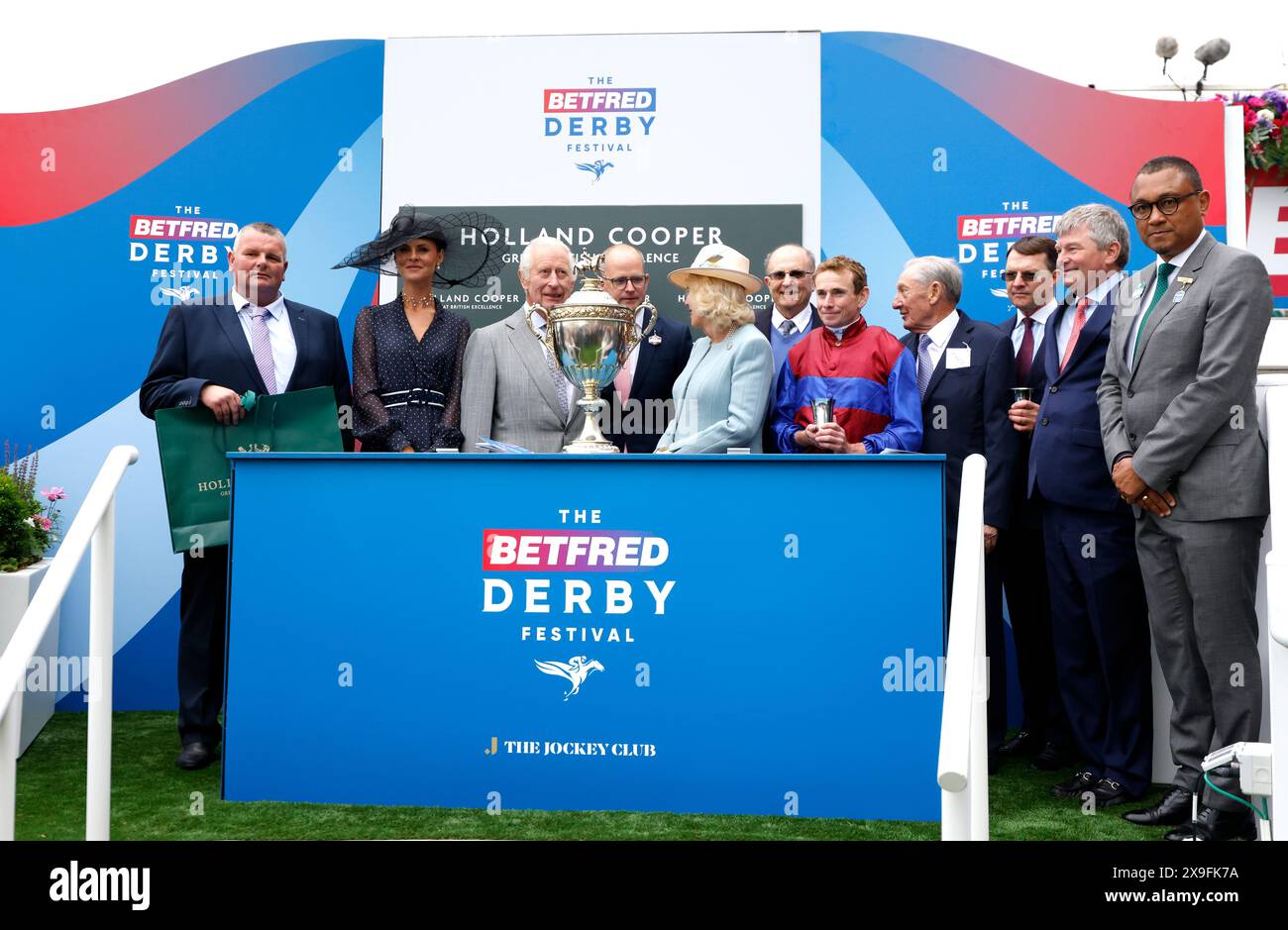 King Charles III and Queen Camilla presenting the trophy to the winner ...