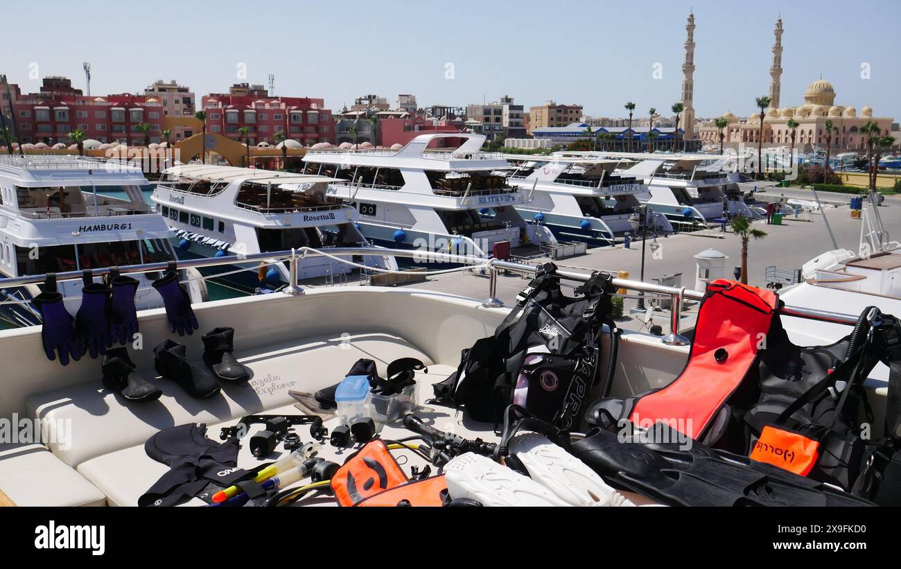 Scuba gear dries out on a dive boat in Hurghada after a diving ...