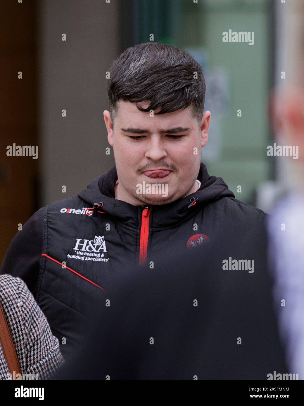 Jordan Devine leaves Laganside Court, Belfast, where he and two other ...