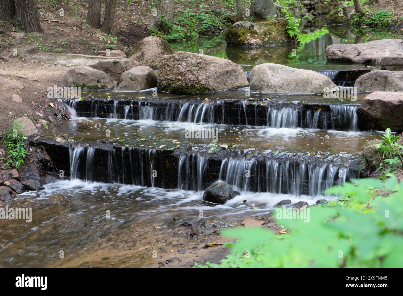 Small artificial waterfall hi-res stock photography and images - Alamy
