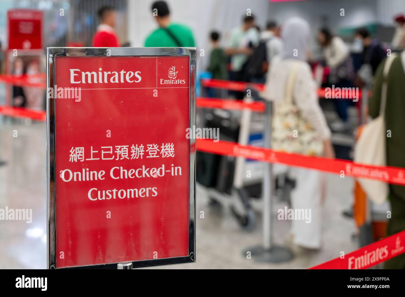 A sign from Emirates, the United Arab Emirates airline, indicating the ...