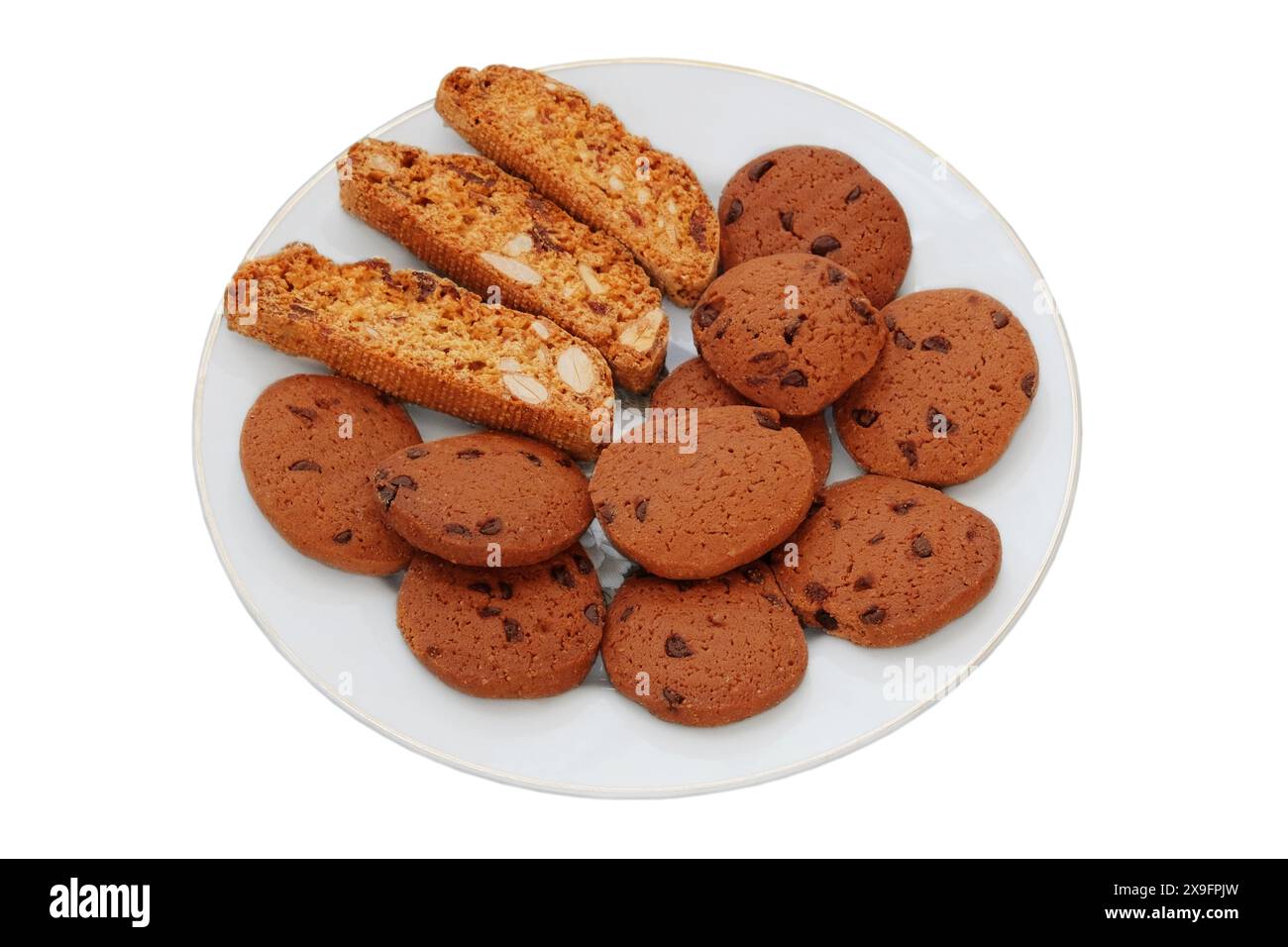 Biscotti and chocolate chip cookies on a plate isolated on a white ...