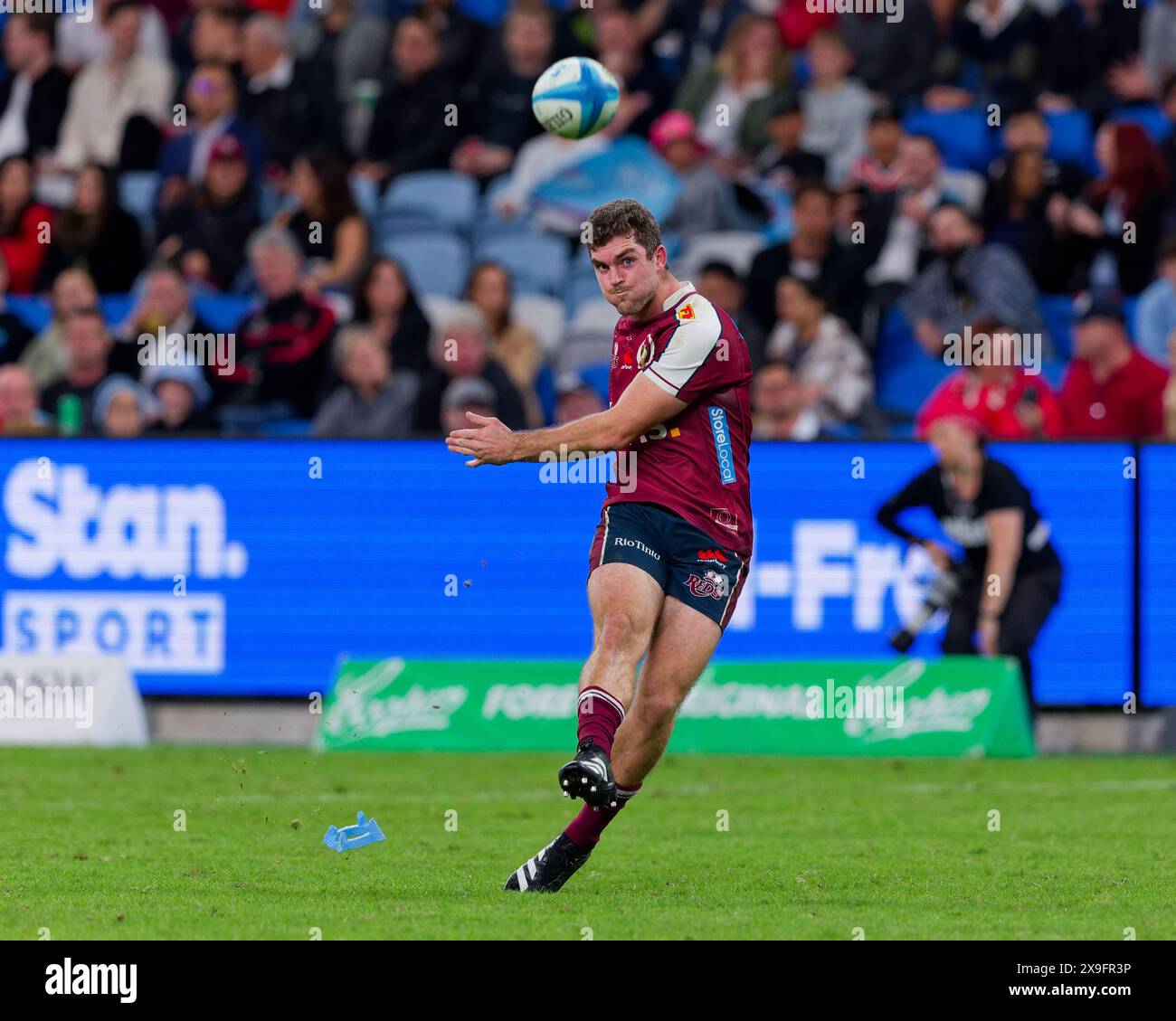 Sydney, Australia. 31st May, 2024. Lawson Creighton of the Reds kicks ...