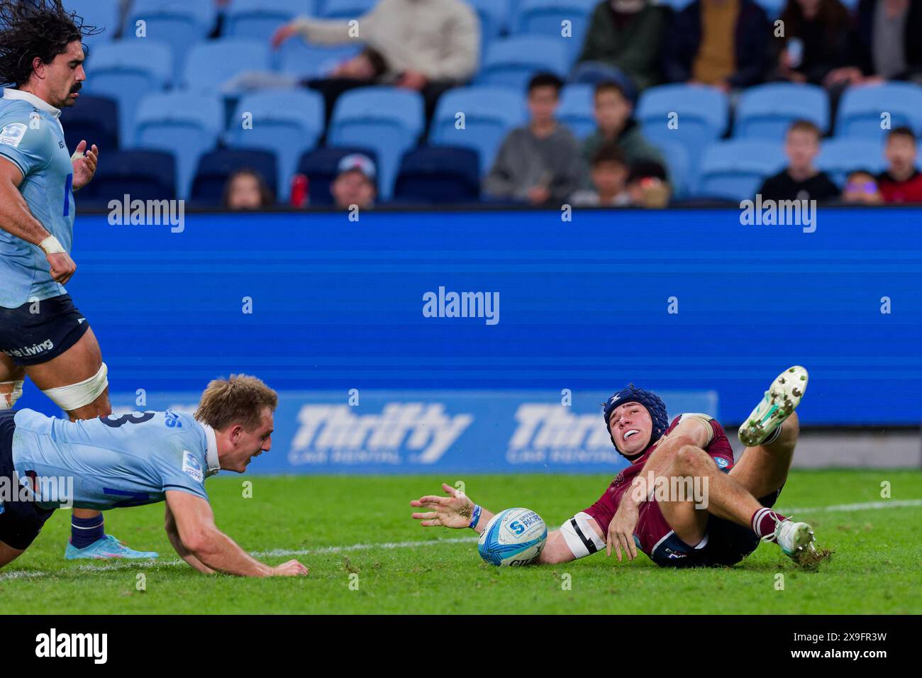 Sydney, Australia. 31st May, 2024. Josh Flook of the Reds scores a try ...