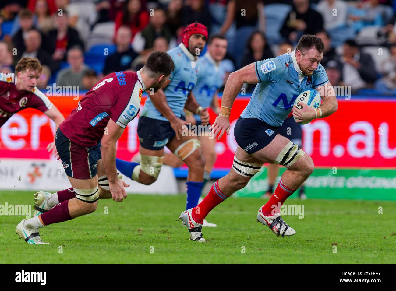 Sydney, Australia. 31st May, 2024. Jed Holloway of the Waratahs runs ...