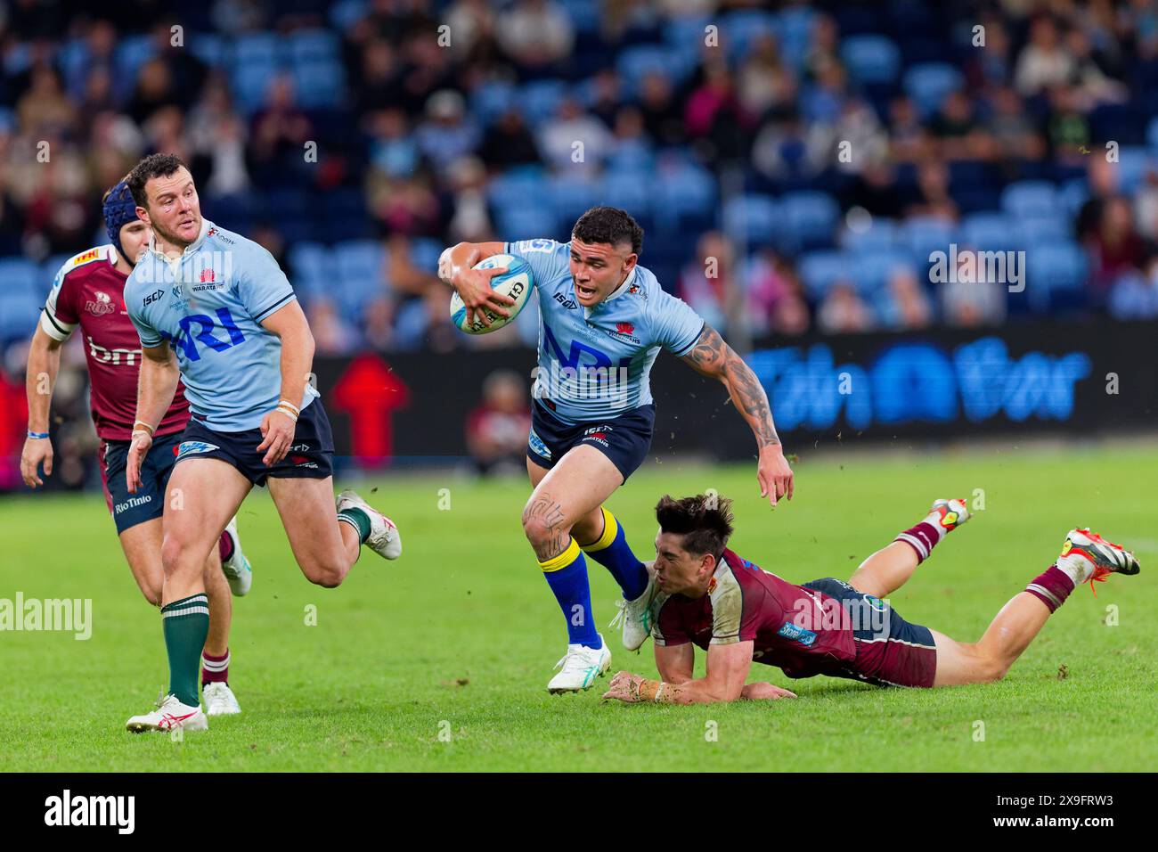Sydney, Australia. 31st May, 2024. Izaia Perese of the Waratahs evades ...