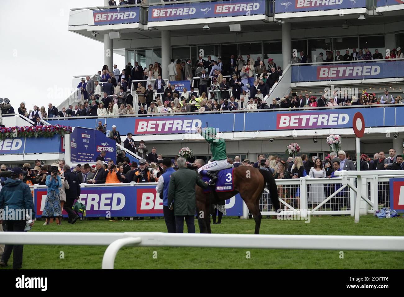 Epsom, Surrey, UK. 31st May, 2024. Ezeliya and jockey CD Hayes greets ...