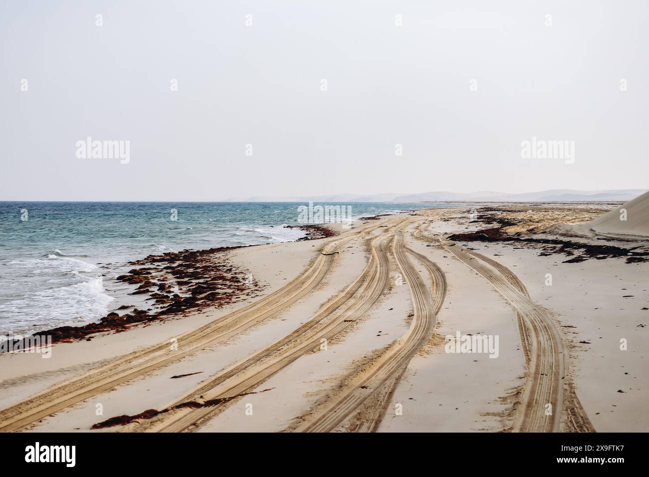 The Persian Gulf coast in the south of Qatar, on the border with Saudi ...