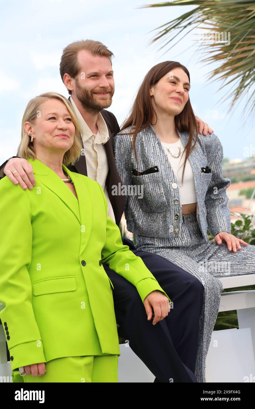 Cannes, France. 16th May, 2024. Trine Dyrholm, Magnus von Horn and Vic ...