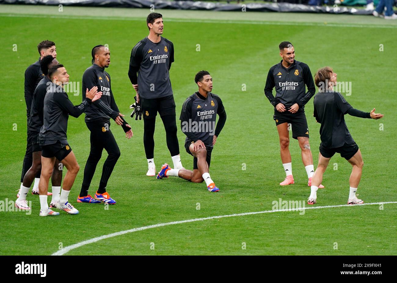 Real Madrid's Jude Bellingham (centre) during a training session at ...