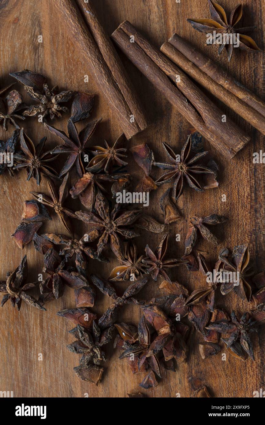 Flat lay food photography of cinnamon sticks and anise stars on an ...