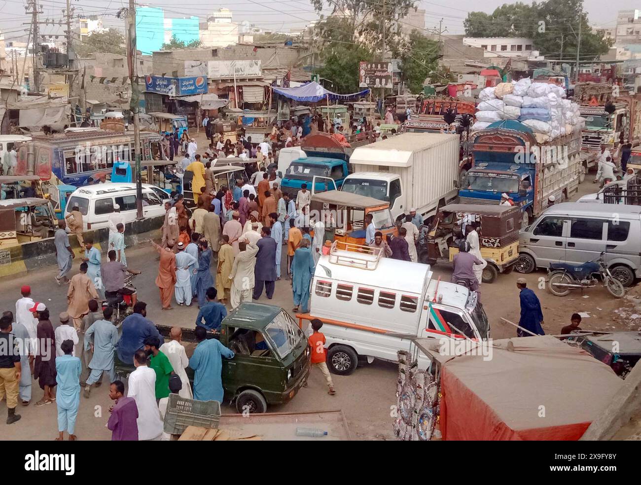 Residents of Moach Goth are blocked main River road as they are holding ...