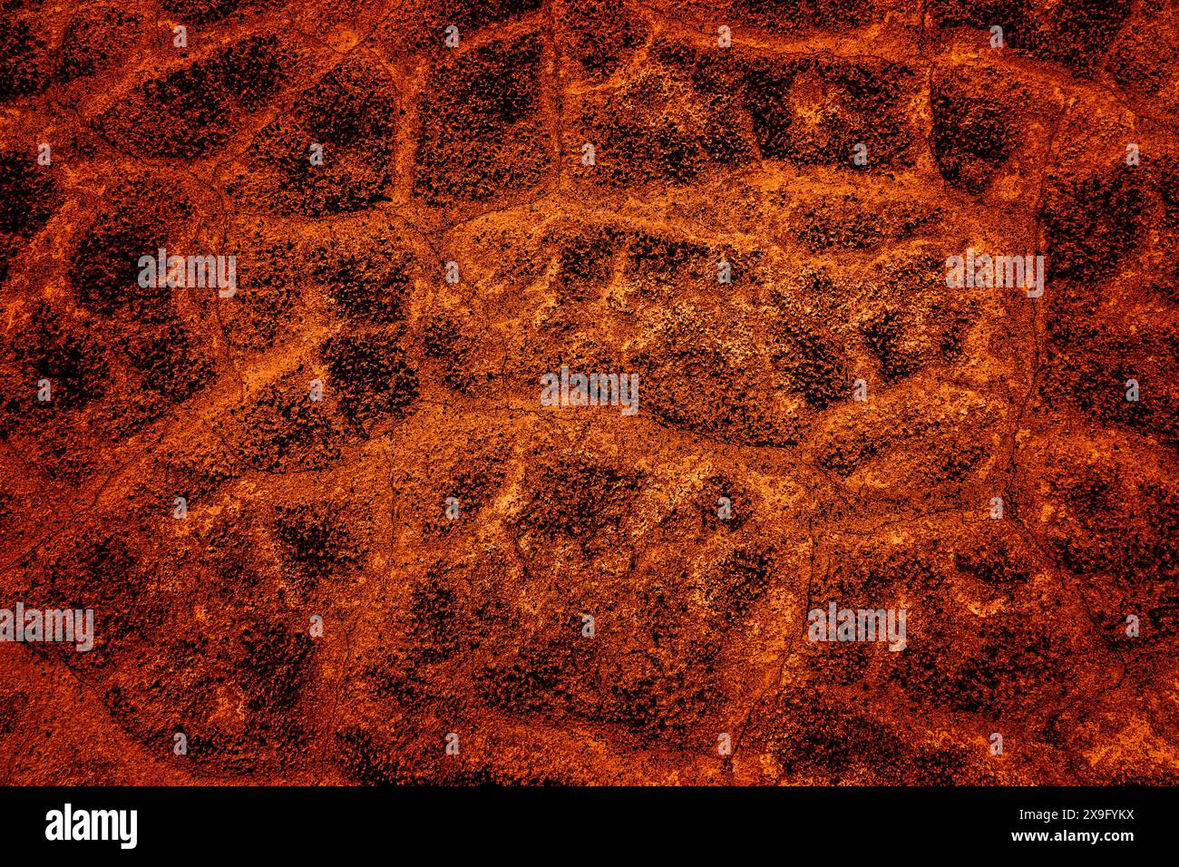 orange texture with cracks and saturated color Stock Photo - Alamy