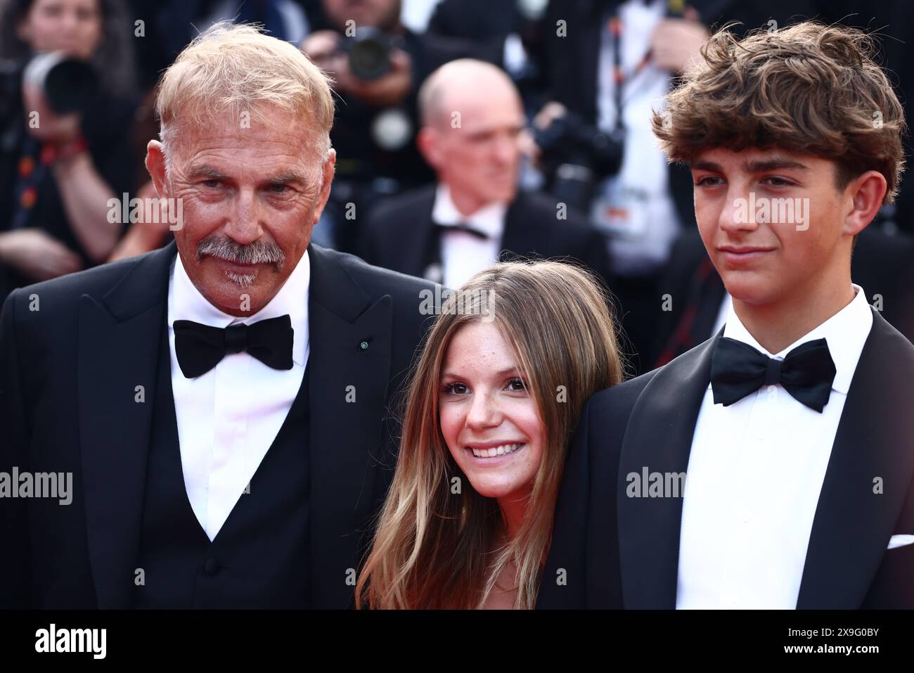Cannes, France. 19th May, 2024. Kevin Costner with his daughter Grace Avery Costner and son ...