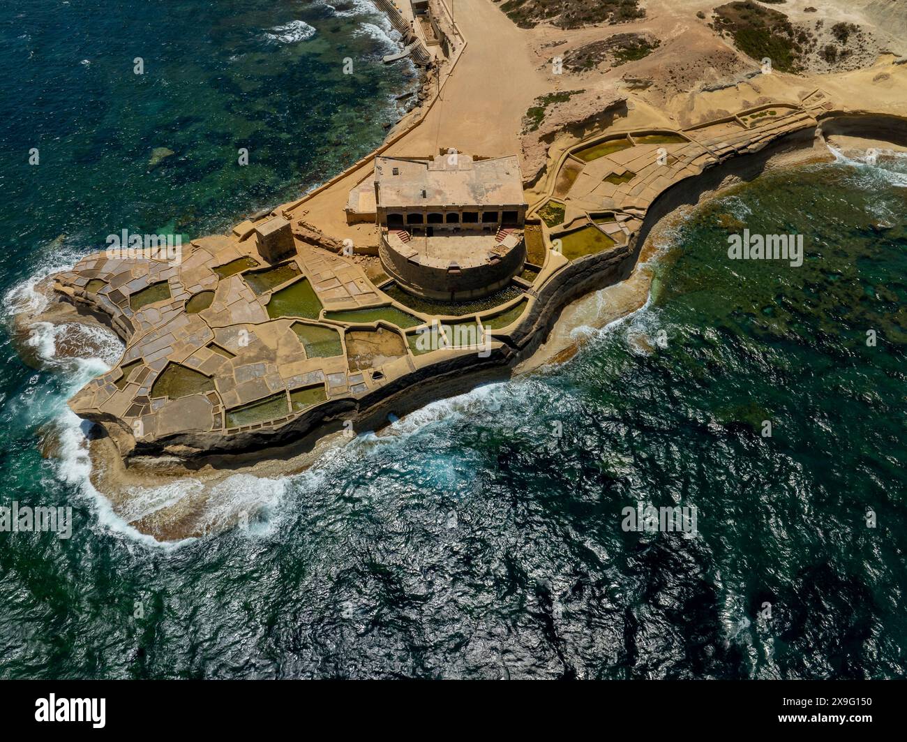 Famous touristic attraction in Gozo island the Salt Pans in Xwejni Bay ...