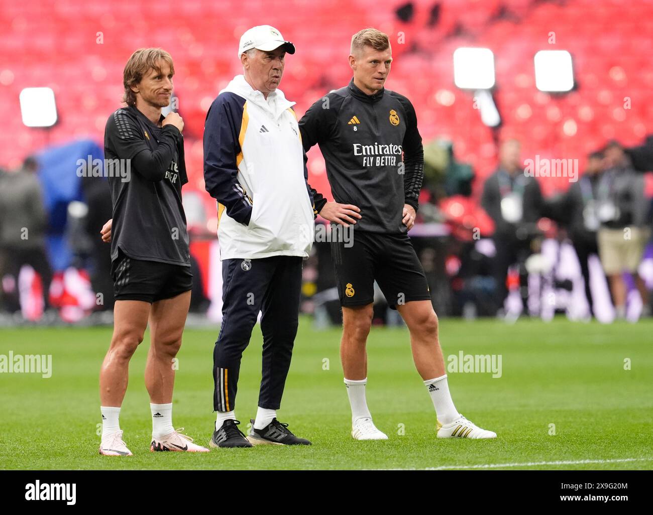 Real Madrid manager Carlo Ancelotti (centre), Luka Modric (left) and ...