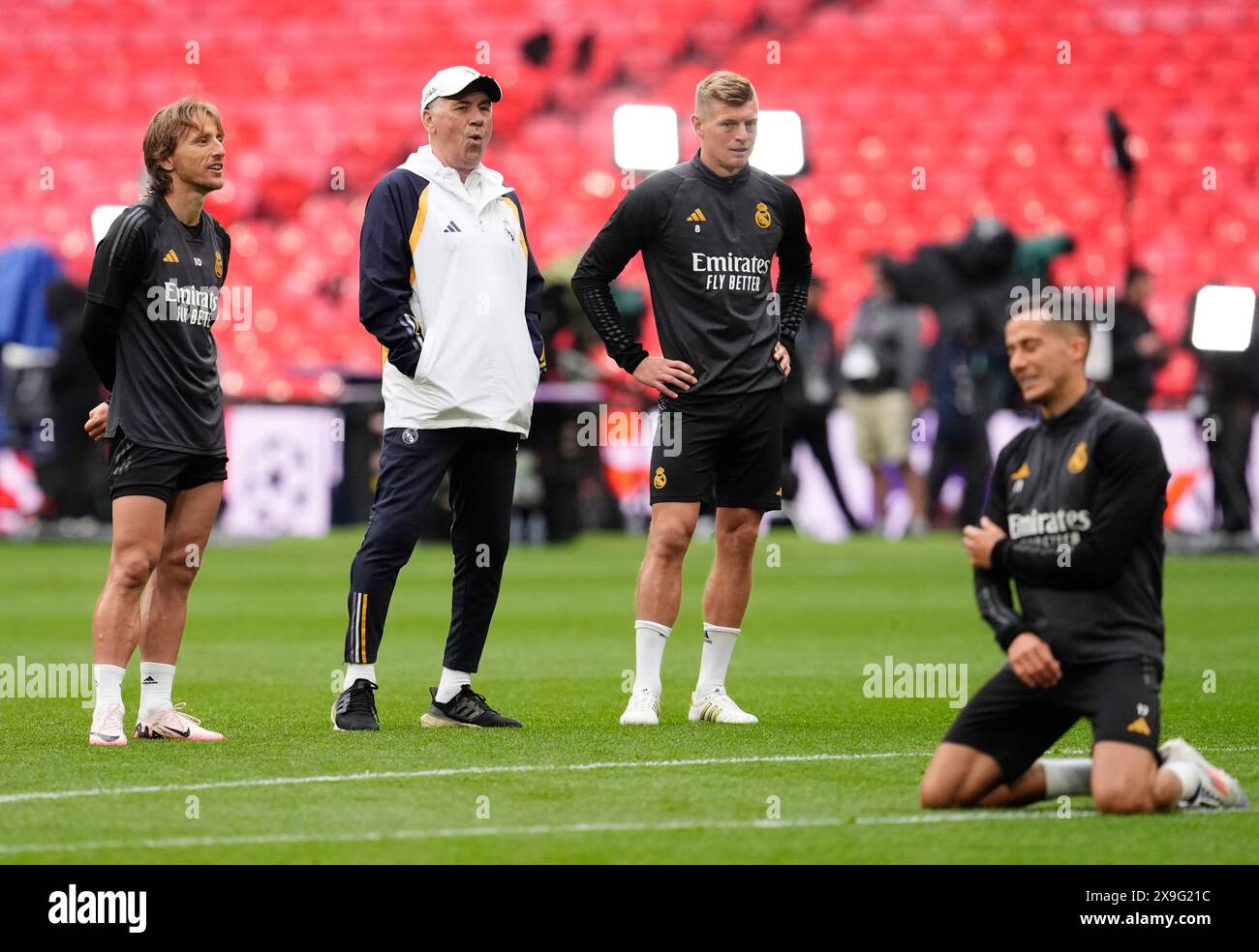 Real Madrid manager Carlo Ancelotti (centre), Luka Modric (left) and Toni Kroos (right) during a ...