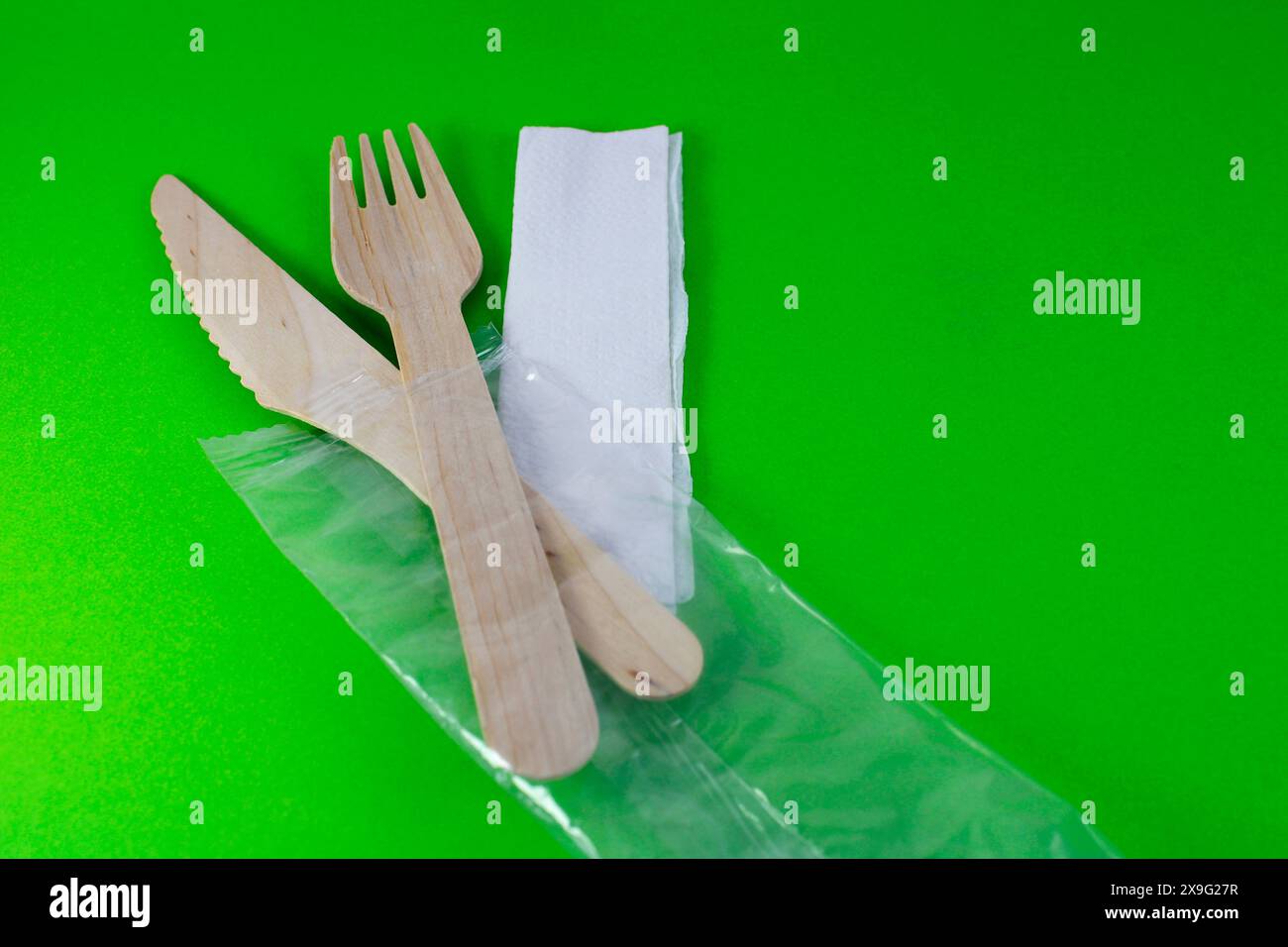 Open packaging with disposable wooden cutlery Stock Photo - Alamy