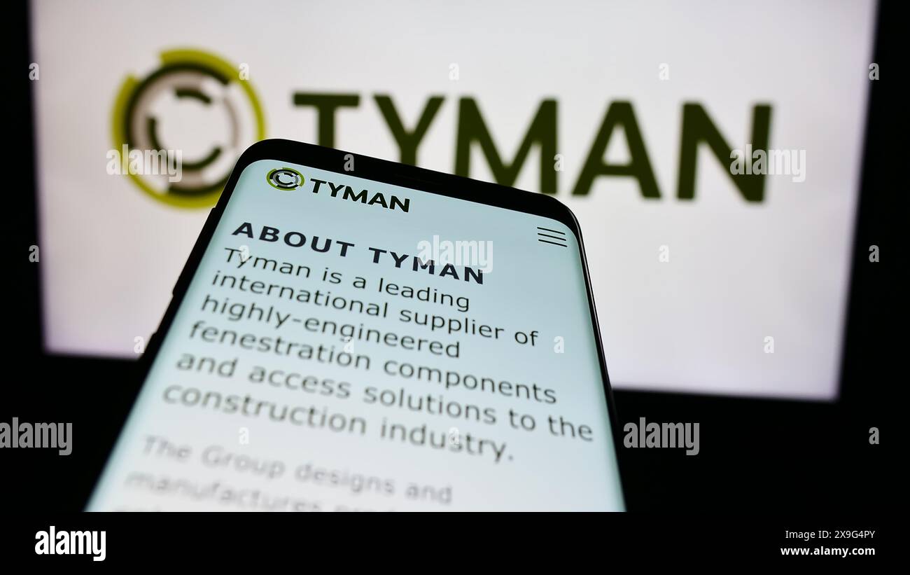 Smartphone with website of British building products company Tyman plc ...