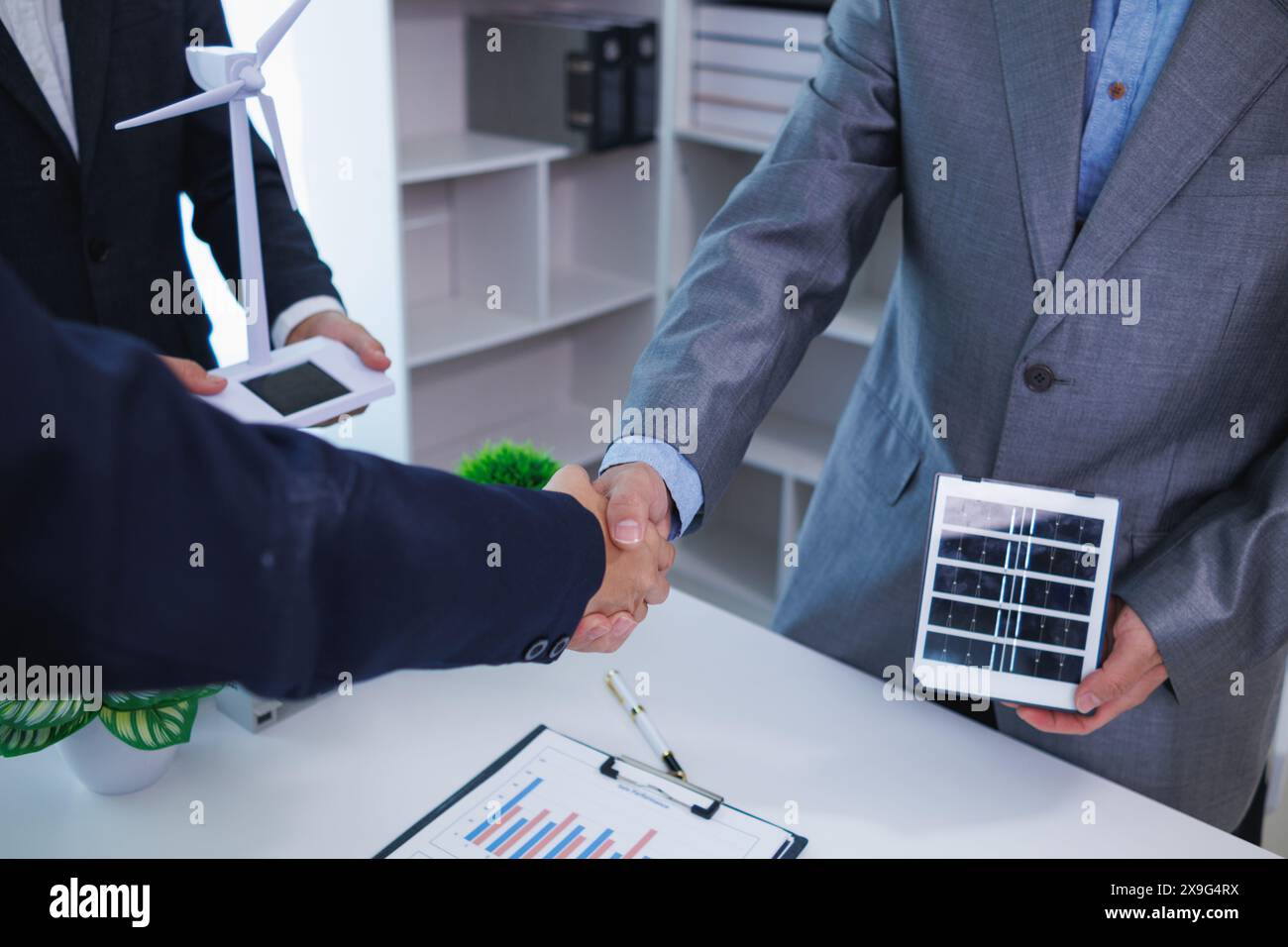 architects and investors discuss real estate projects using clean ...