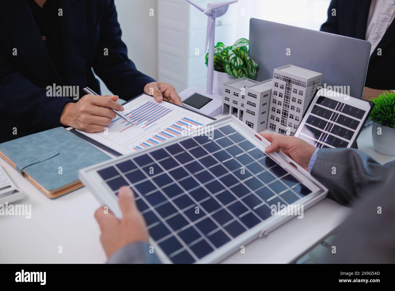 architects and investors discuss real estate projects using clean ...