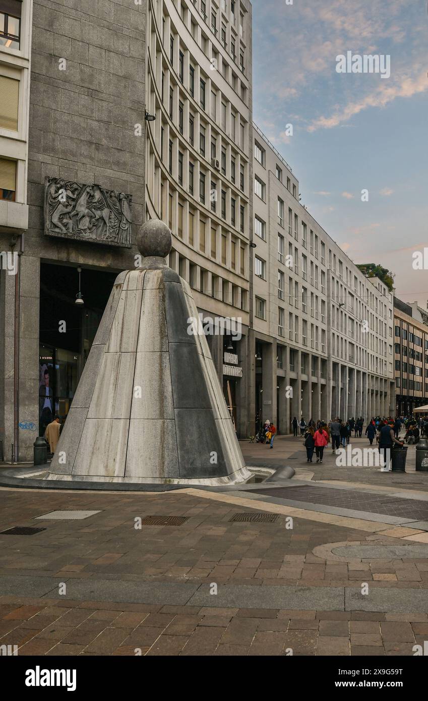 Piazza San Babila square with the truncated pyramid fountain by ...