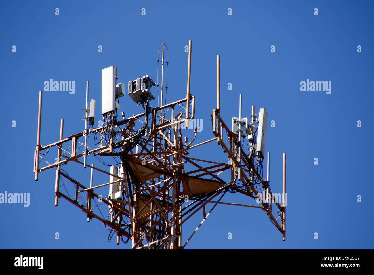 detail metal tower structure with antennas and transmission, reception ...
