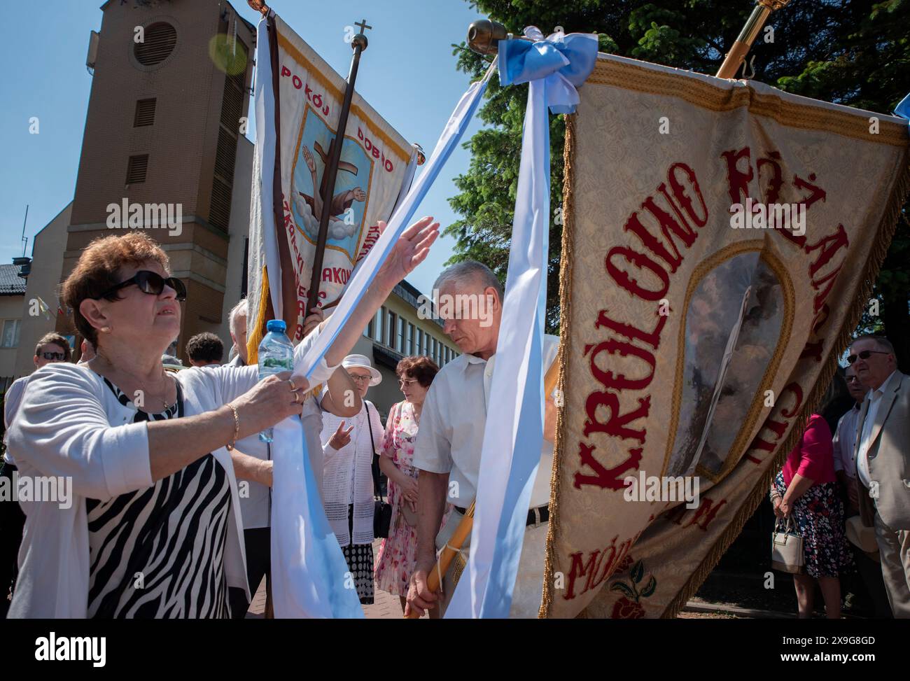 The faithful prepare for the procession during Corpus Christi in Gdansk ...