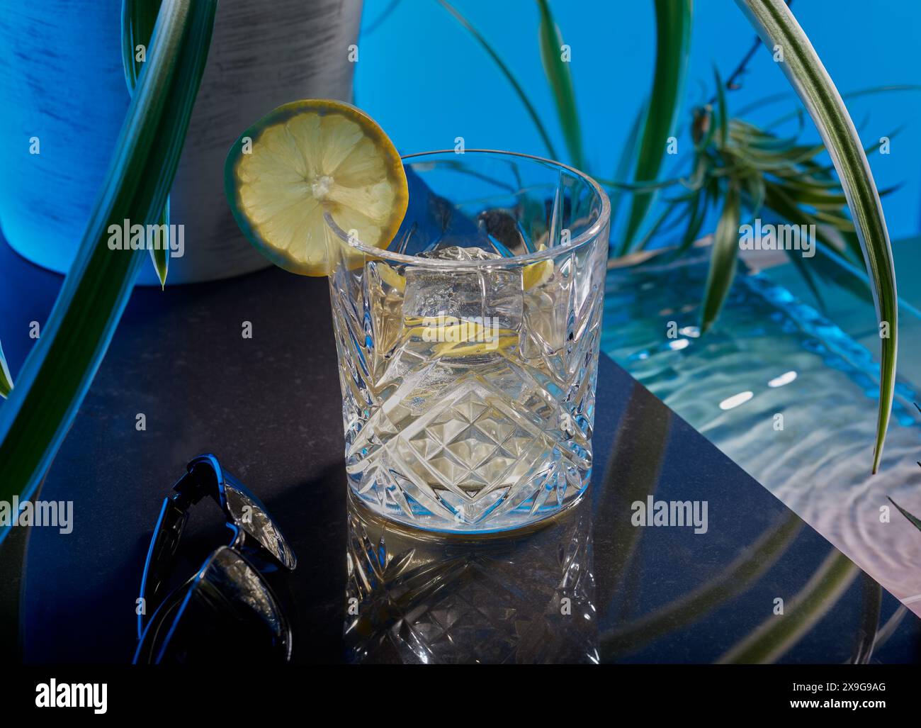 Cocktail in a whisky tumbler glass Stock Photo - Alamy