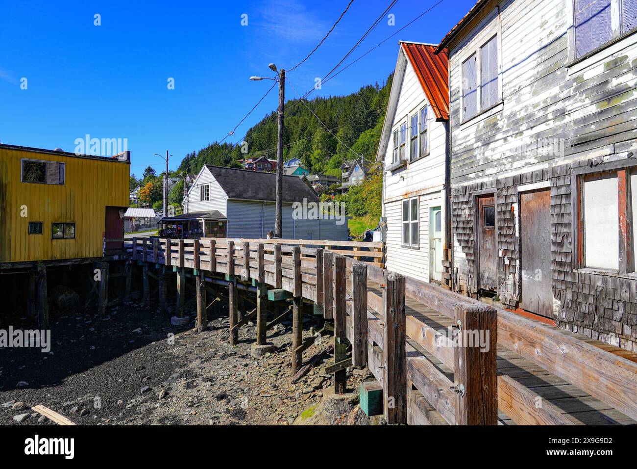 Wooden houses along a boardwalk in Hopkins Alley in Ketchikan, the ...
