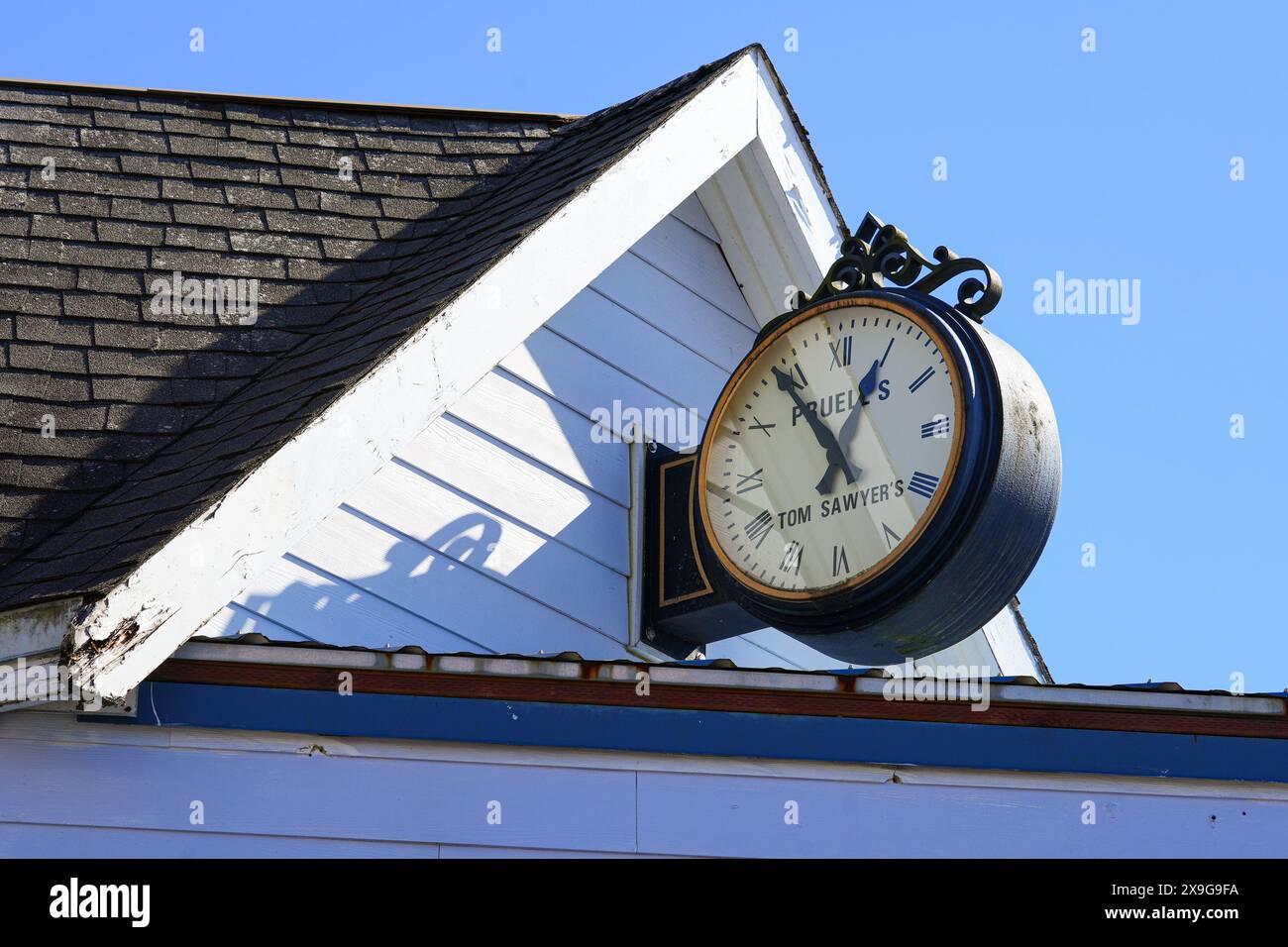 Vintage clock on a wall in downtown Ketchikan, Alaska Stock Photo - Alamy