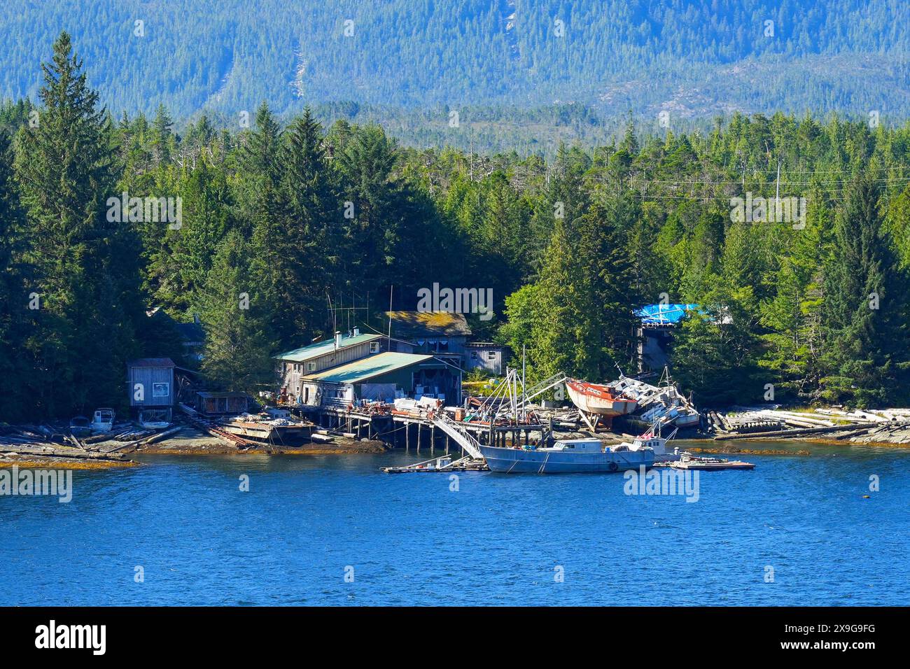 Wooden houses on the beach of Pennock Island near Ketchikan in ...