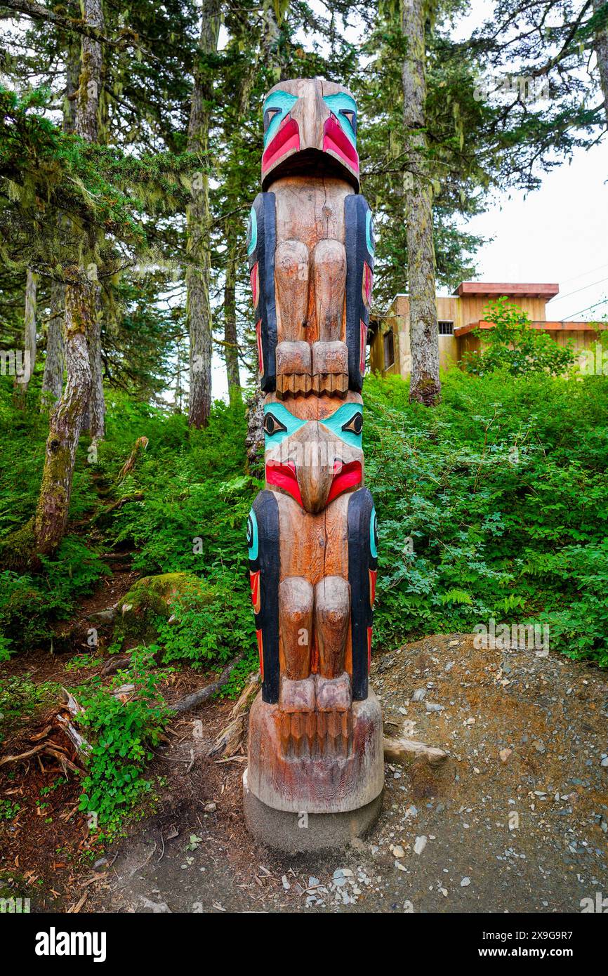 Native American totem pole in a forest on top of Mount Roberts above ...