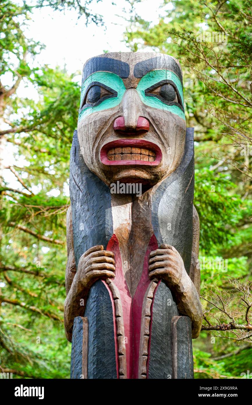 Native American totem pole in a forest on top of Mount Roberts above ...